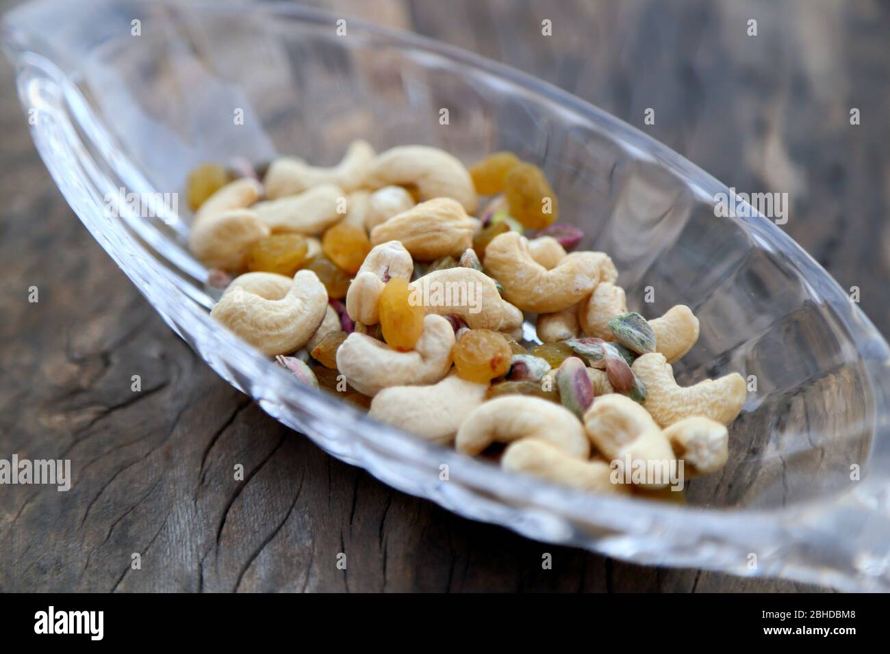 Delicious and healthy mixed dried fruits, nuts and seeds Stock Photo - Alamy