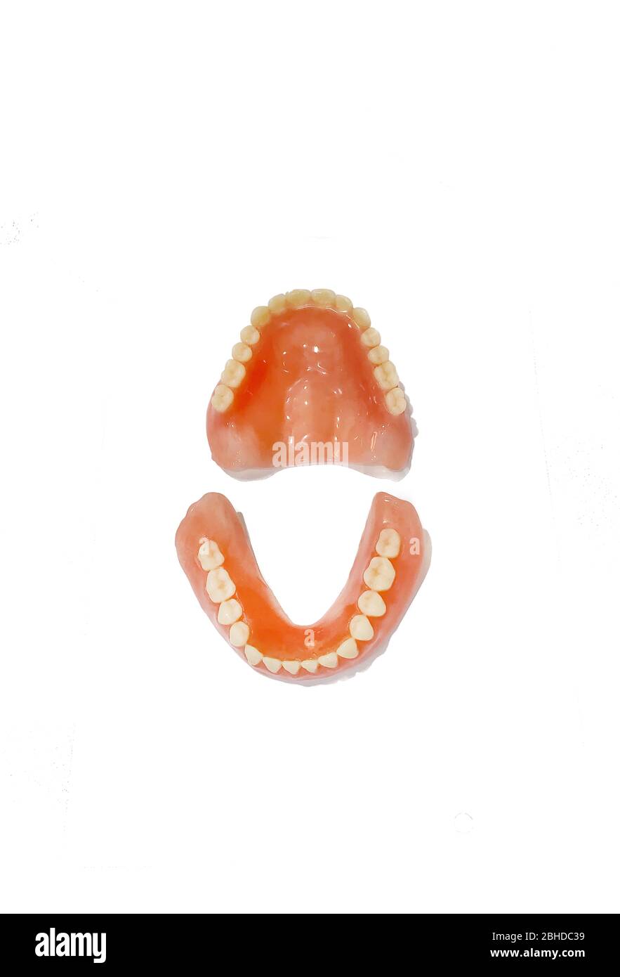 The complete full dentures isolated on white background Stock Photo - Alamy