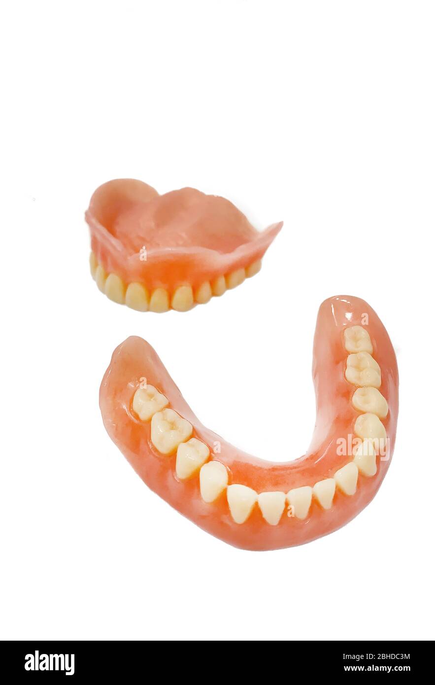 The complete full dentures isolated on white background Stock Photo - Alamy