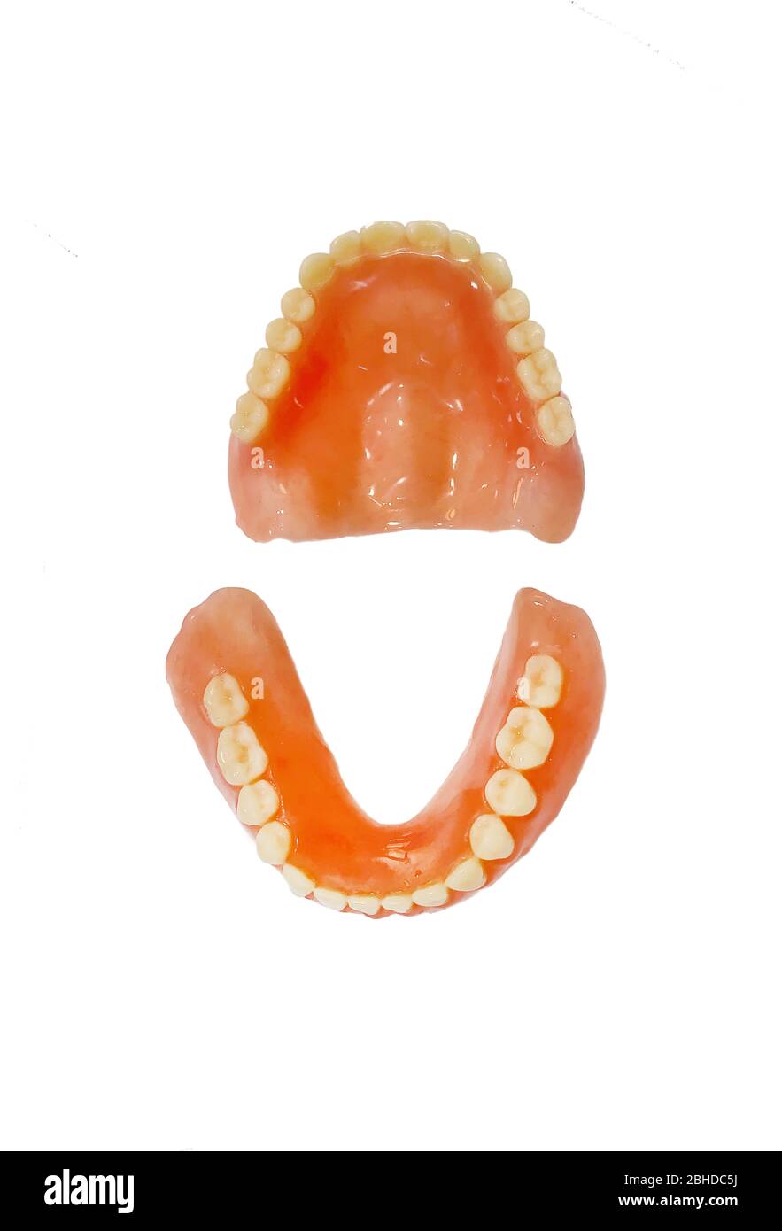 The complete full dentures isolated on white background Stock Photo - Alamy