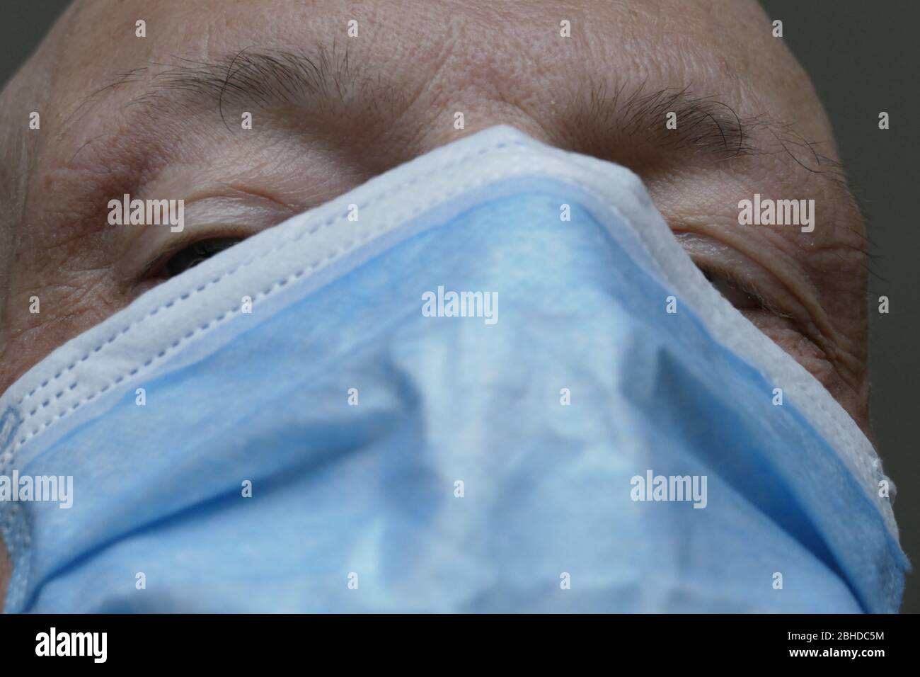 Man with blue respirator; Face; Portrait; Germany; Europe Stock Photo ...