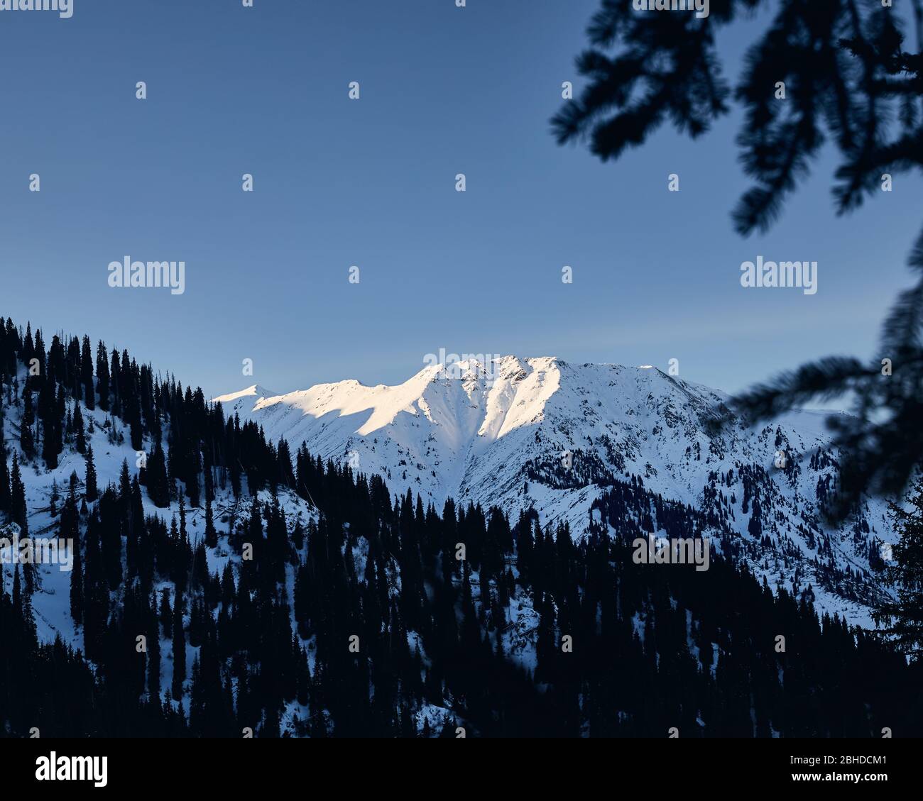 High snowy mountain Kumbel at Zaili Alatay range in Almaty, Kazakhstan ...