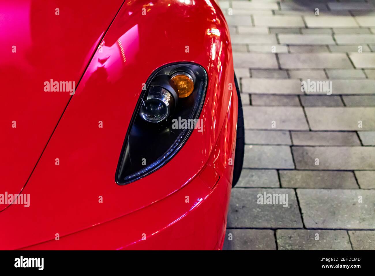 Front view of red ferrari and head lights Stock Photo - Alamy