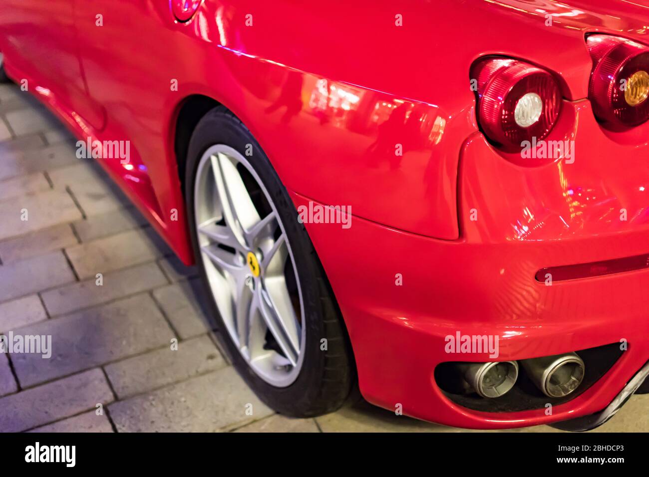 Back view of red ferrari. Exhaust, mag wheels and tail lights Stock ...