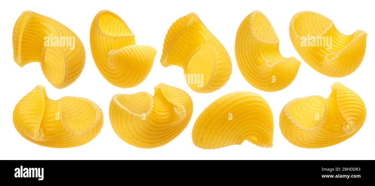 Raw pipe rigate pasta isolated on white background Stock Photo - Alamy