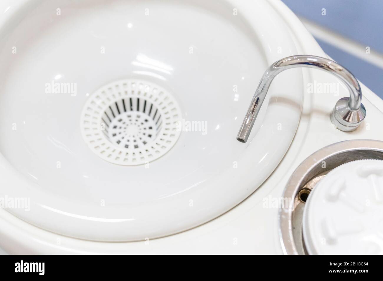 The Mouth wash basin in Dental clinic Stock Photo - Alamy