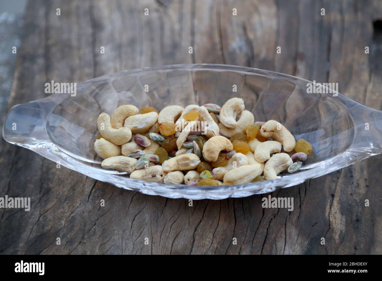 Delicious and healthy mixed dried fruits, nuts and seeds Stock Photo - Alamy
