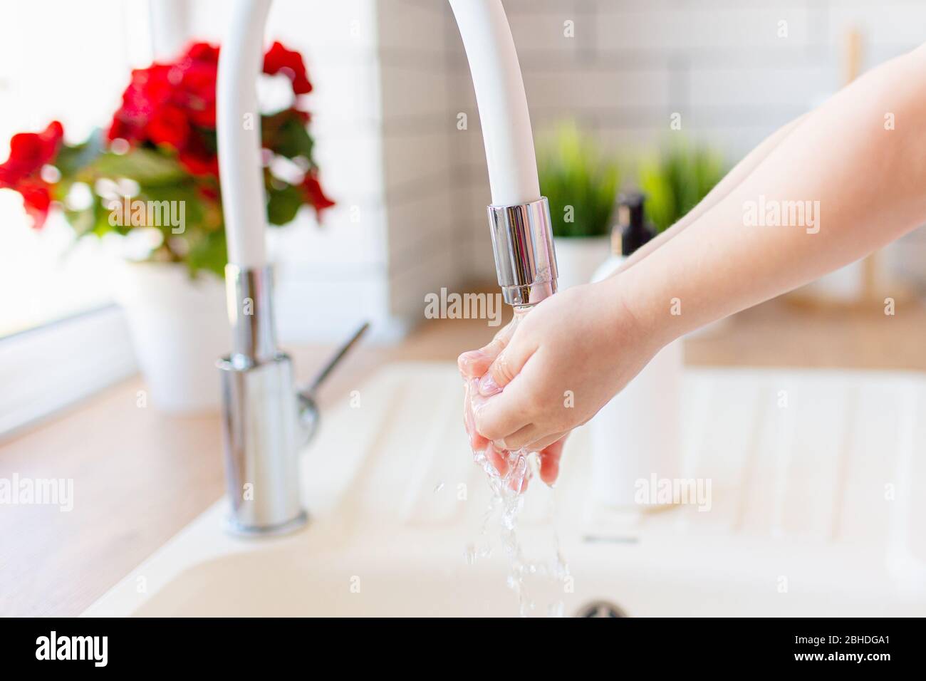Kid girl washing hands hi-res stock photography and images - Alamy