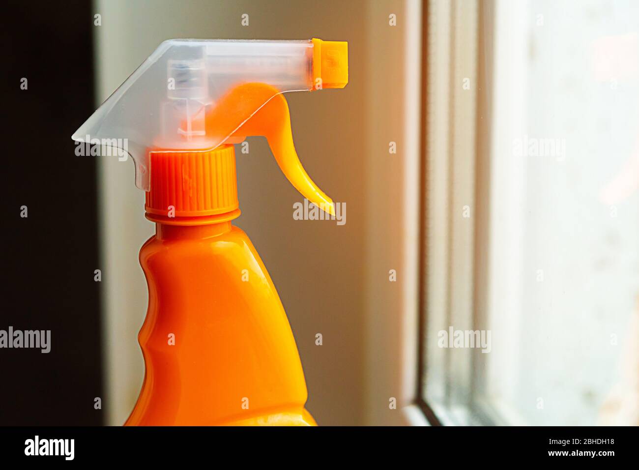 window cleaner on the window sill Stock Photo - Alamy