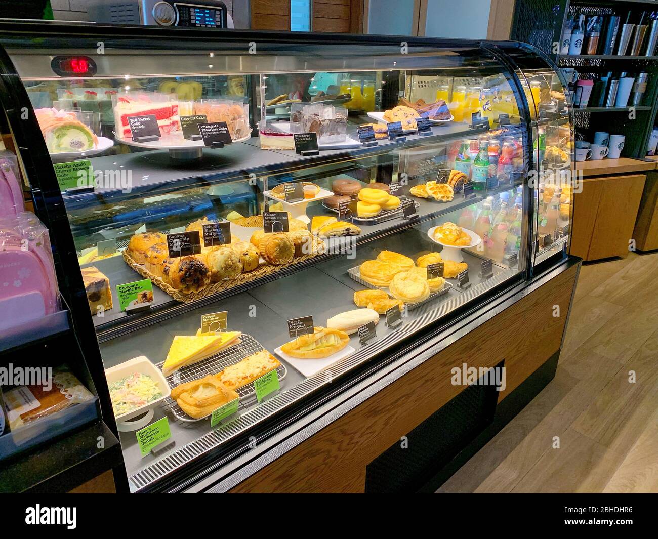 The bakery and pudding display of Starbuck next to the counter in ...