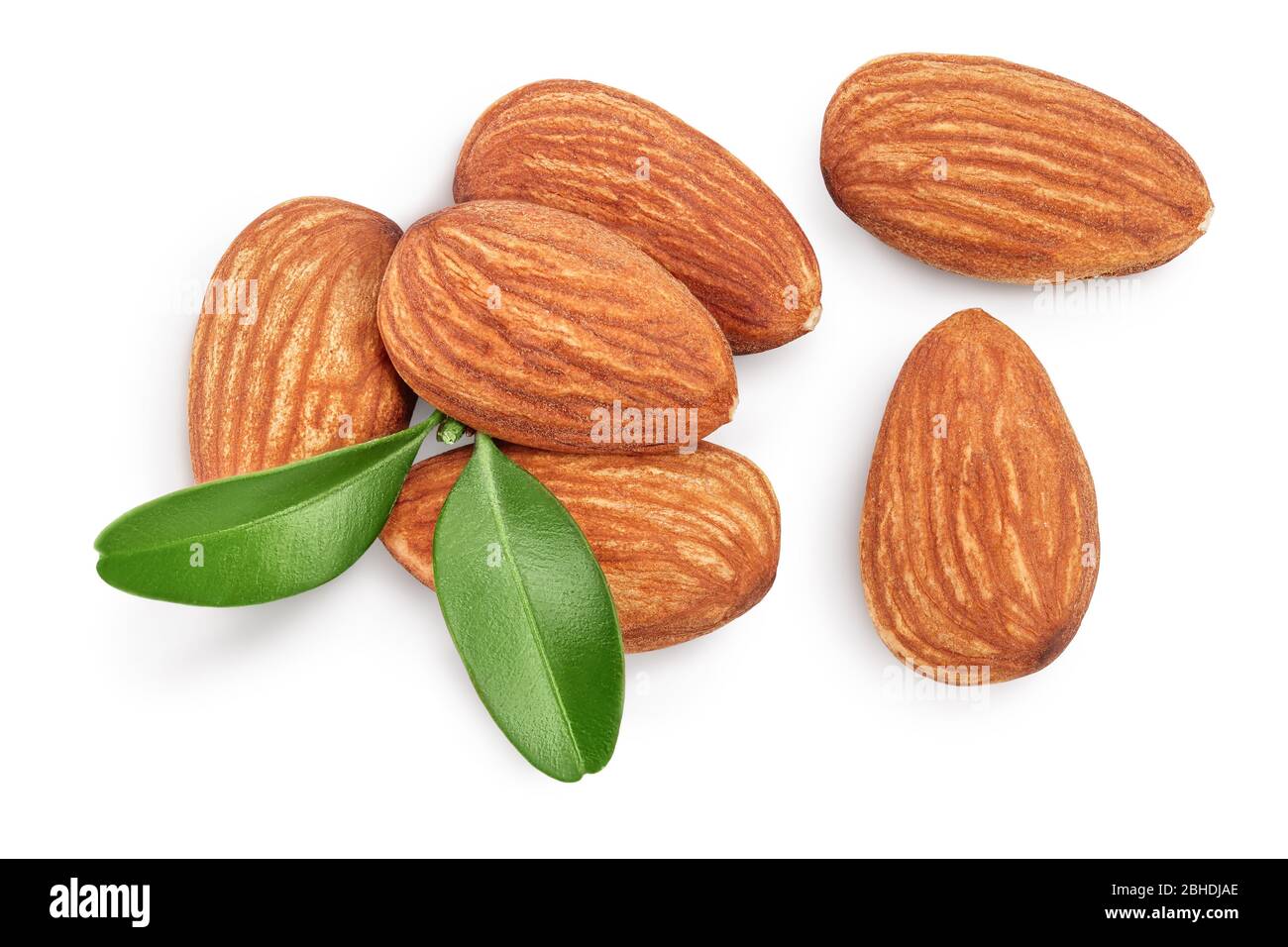 Almonds nuts with leaves isolated on white background with clipping ...