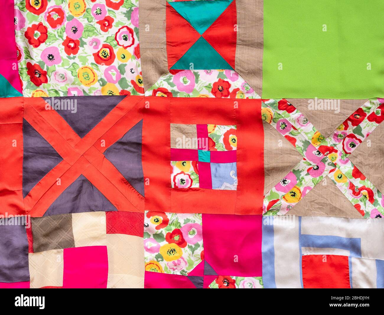 textile background - hand-stitched colorful patchwork cloth Stock Photo ...