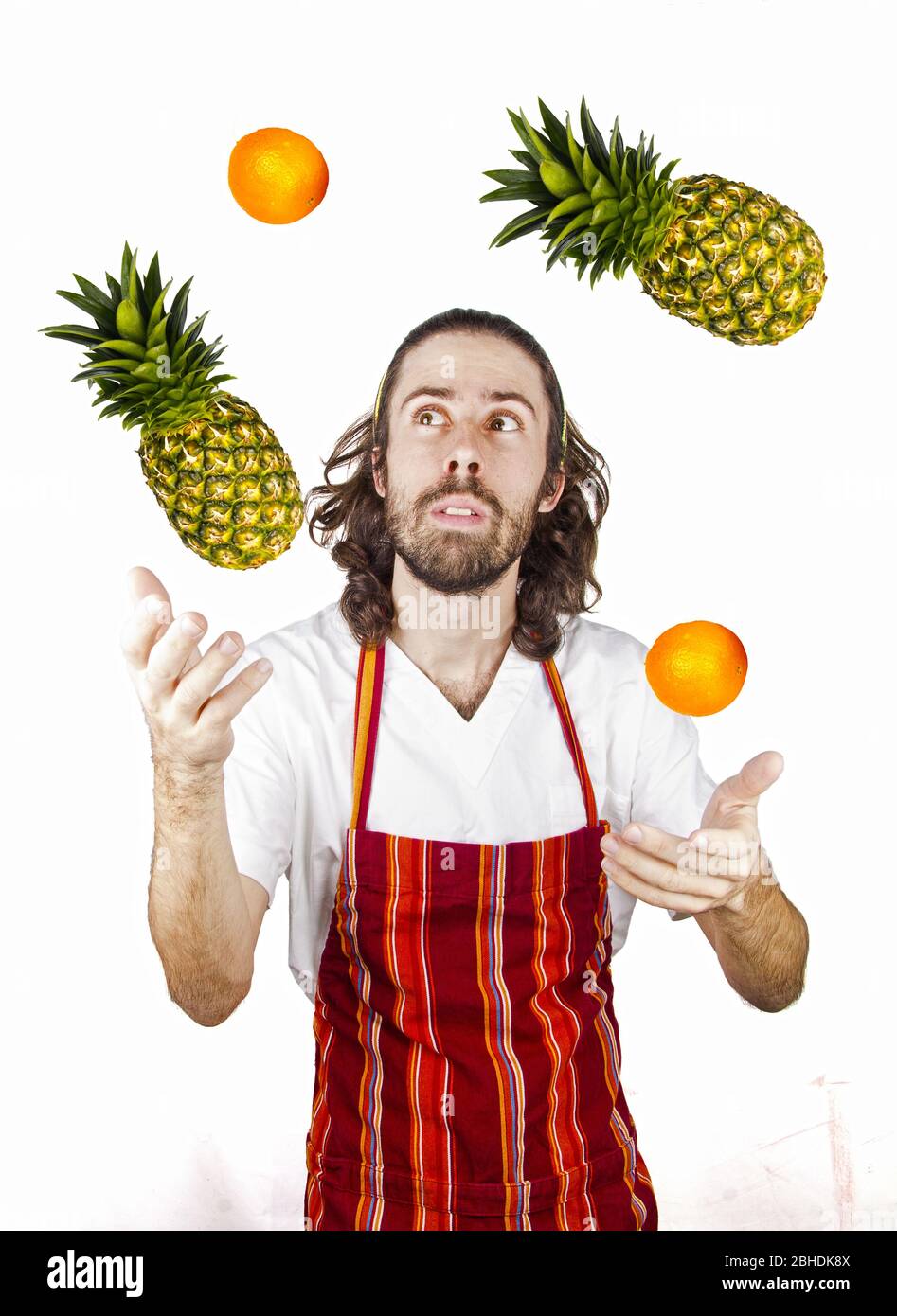 a chef play with the fruit Stock Photo - Alamy
