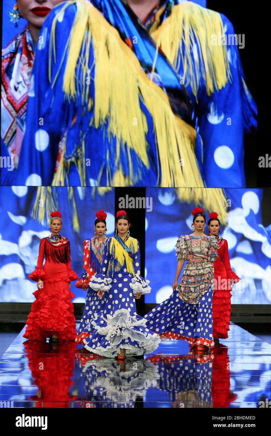SEVILLA, SPAIN - JAN 30: Models wearing dresses from the Laranjeira ...