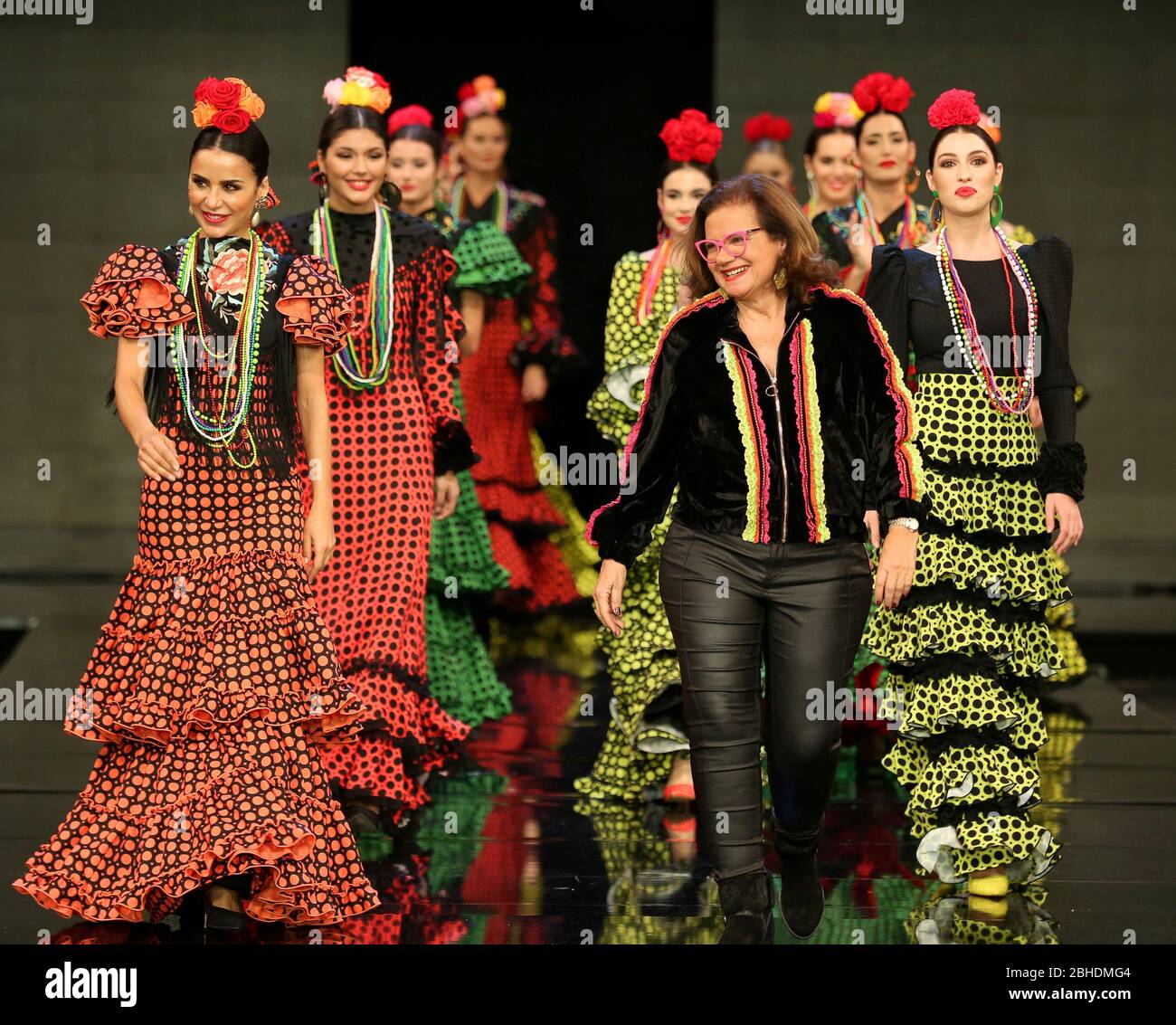 SEVILLA, SPAIN - JAN 30: Designer Pilar Vera and her models at the end ...