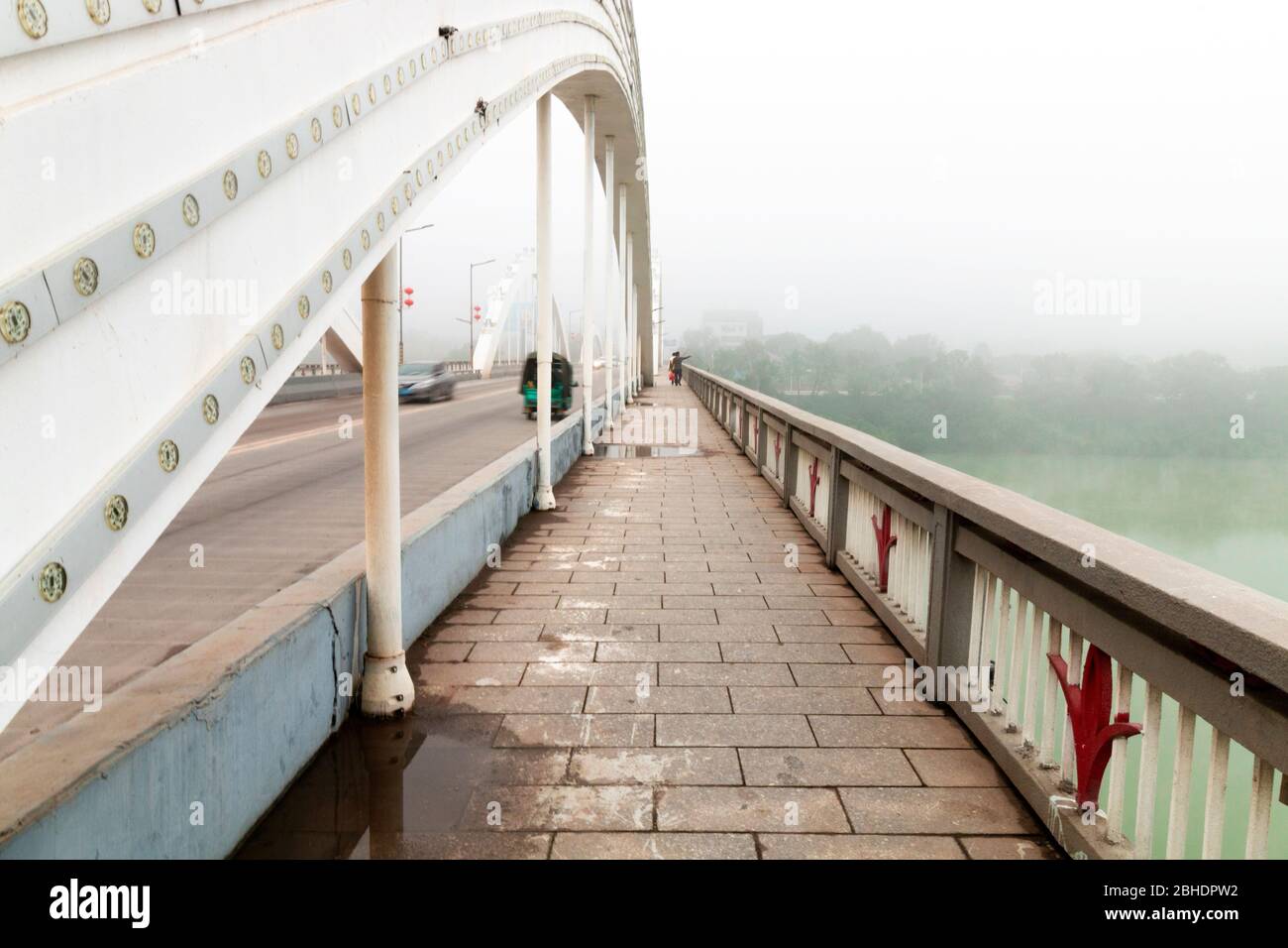 cars speeding on a cable bridge Stock Photo - Alamy