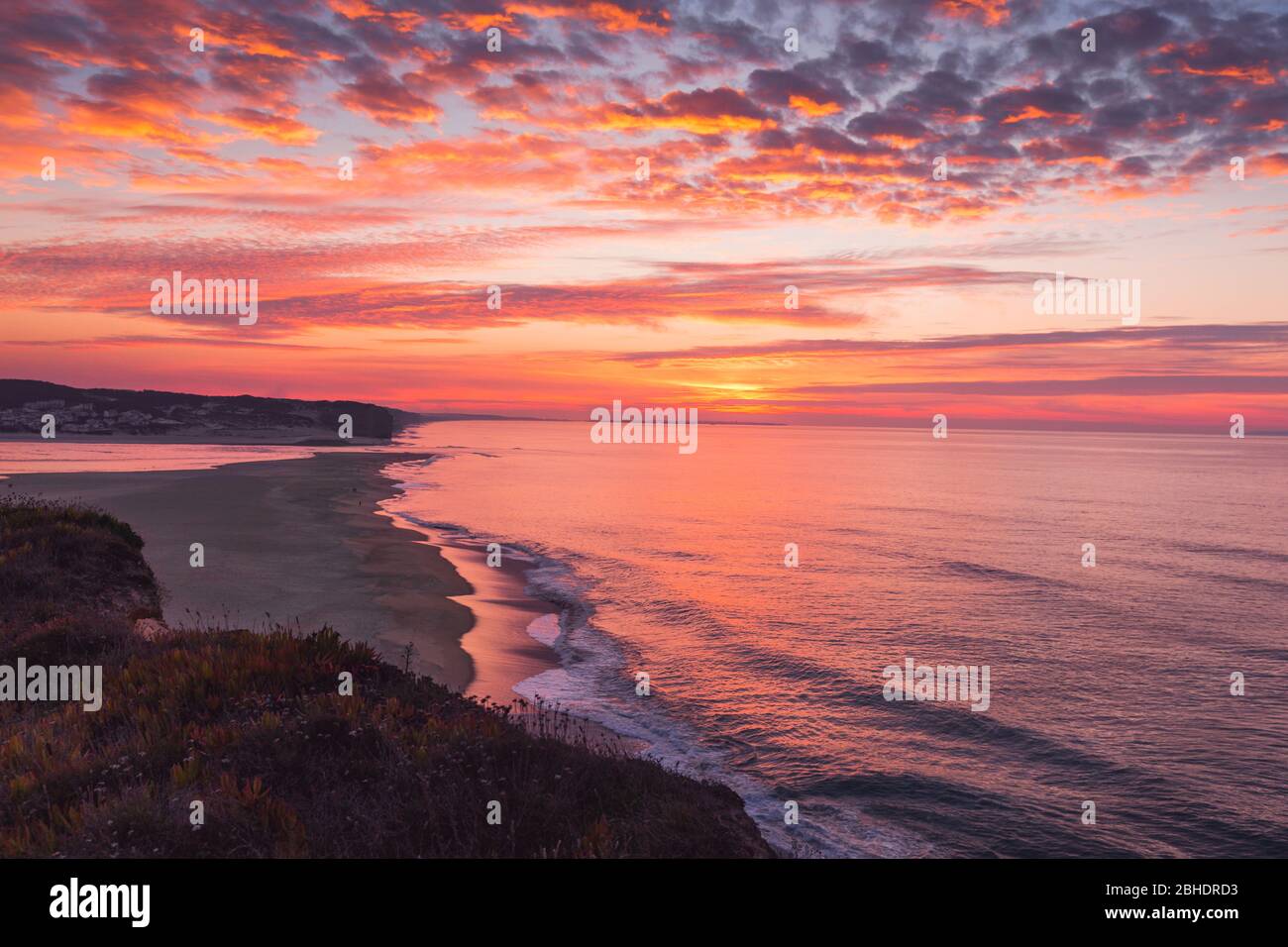 Beautiful sunset at the Portugal beach Stock Photo - Alamy