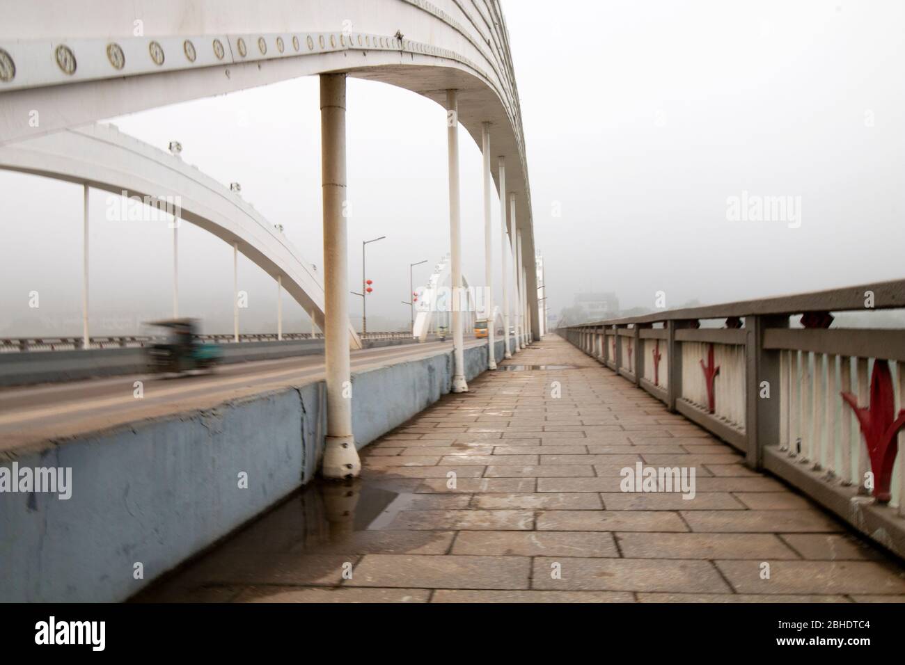 cars speeding on a cable bridge Stock Photo - Alamy
