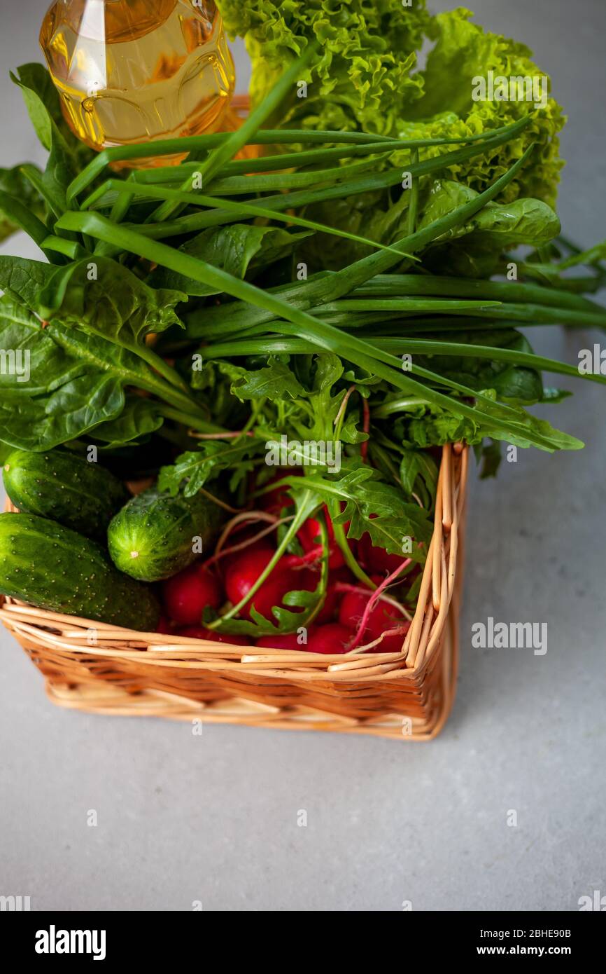 Delivery of products. Box with vegetables and sunflower oil. A set of ...