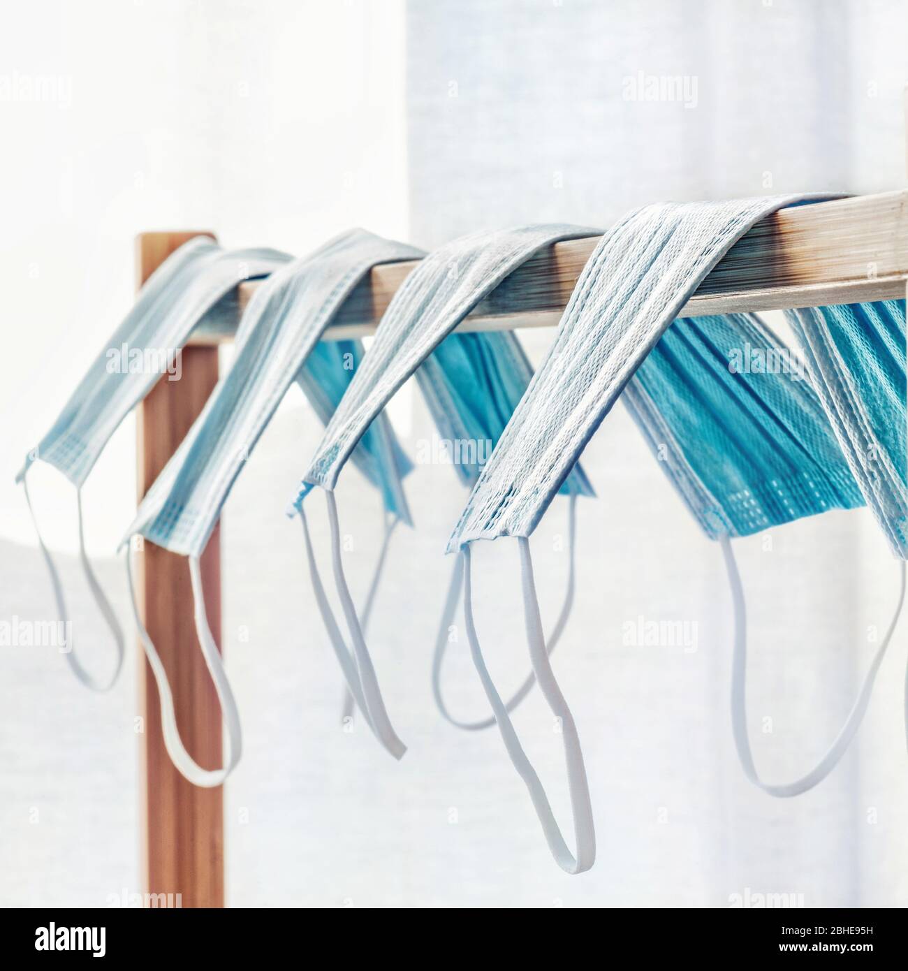 Row of disposable surgical face masks Stock Photo - Alamy