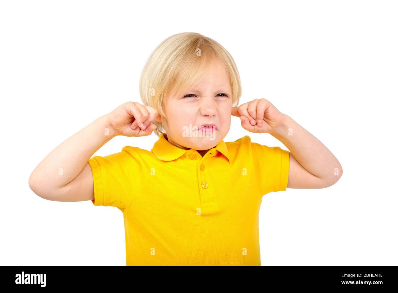 Boy plugging his ears hi-res stock photography and images - Alamy