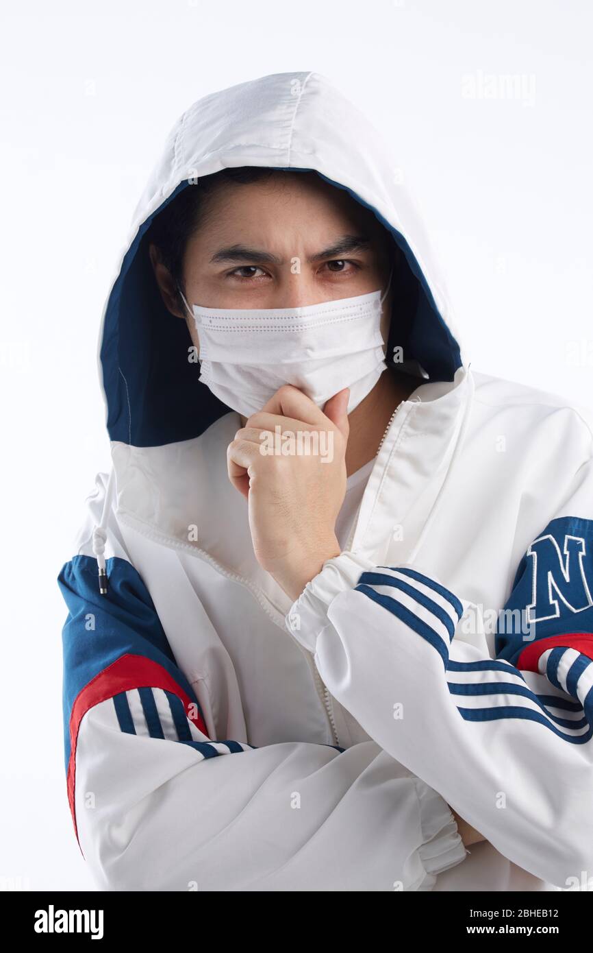 man in hood with white mask Stock Photo - Alamy