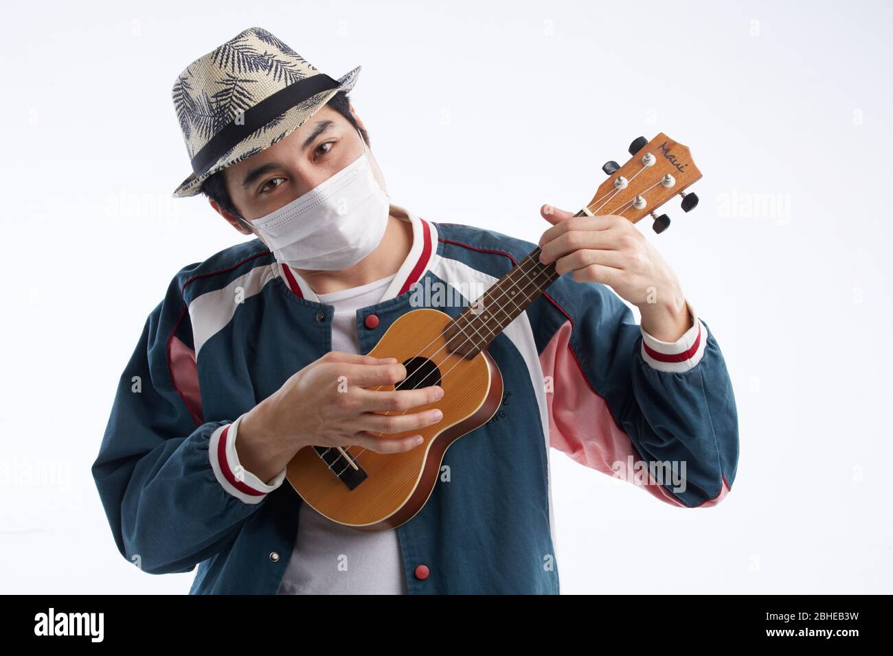 How to play ukulele hi-res stock photography and images - Alamy