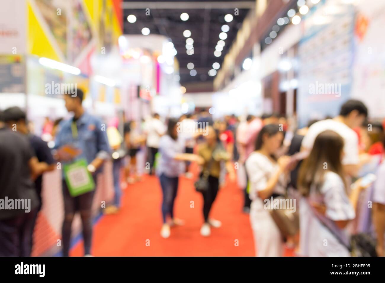 Abstract blurred event exhibition with people background, business ...