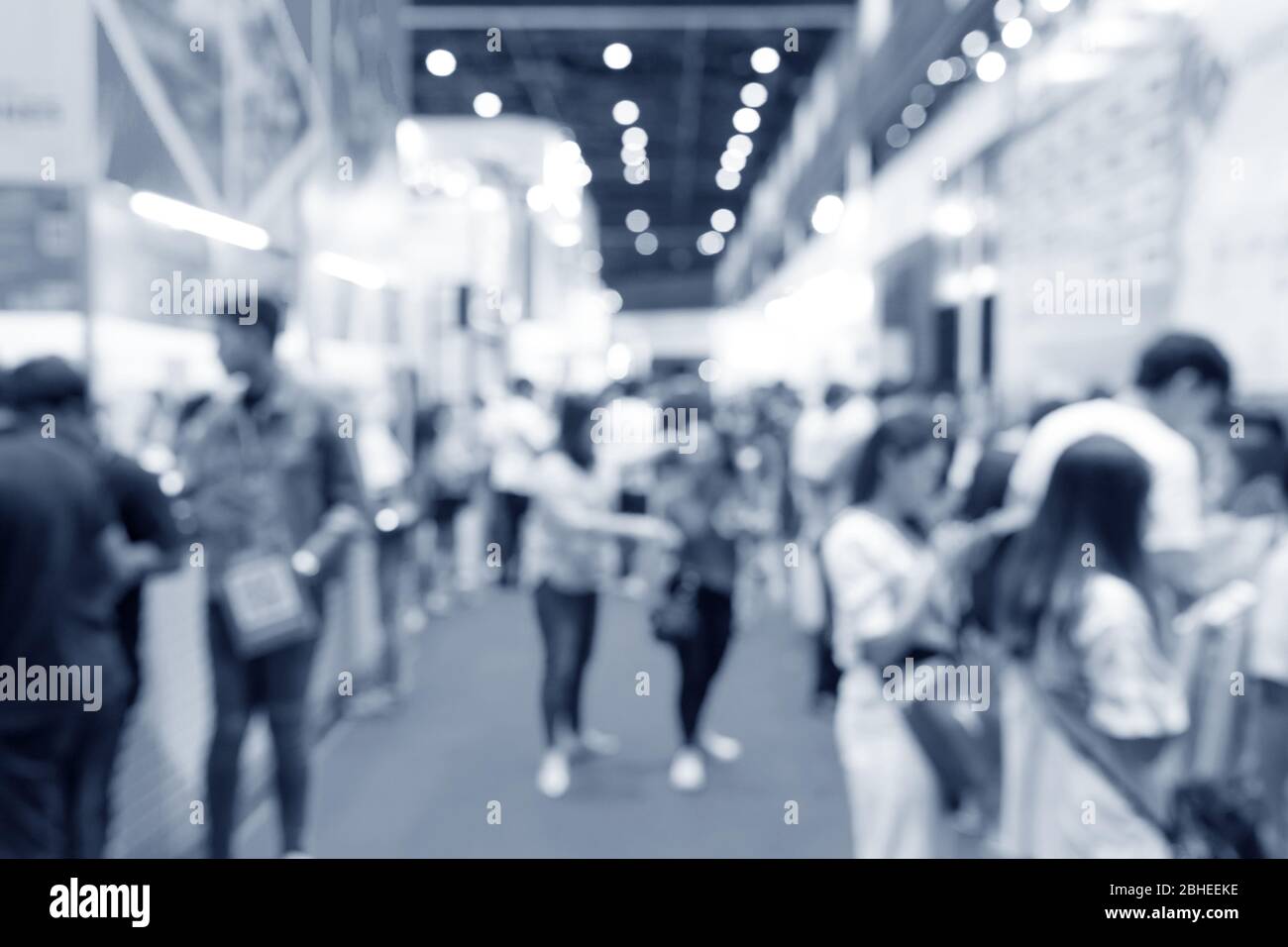 Abstract blurred event exhibition with people background, business ...