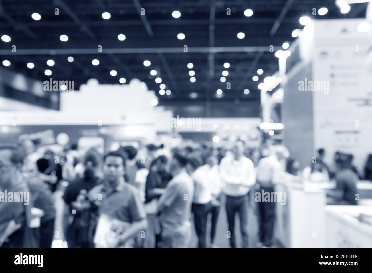 Abstract blurred event exhibition with people background, business ...