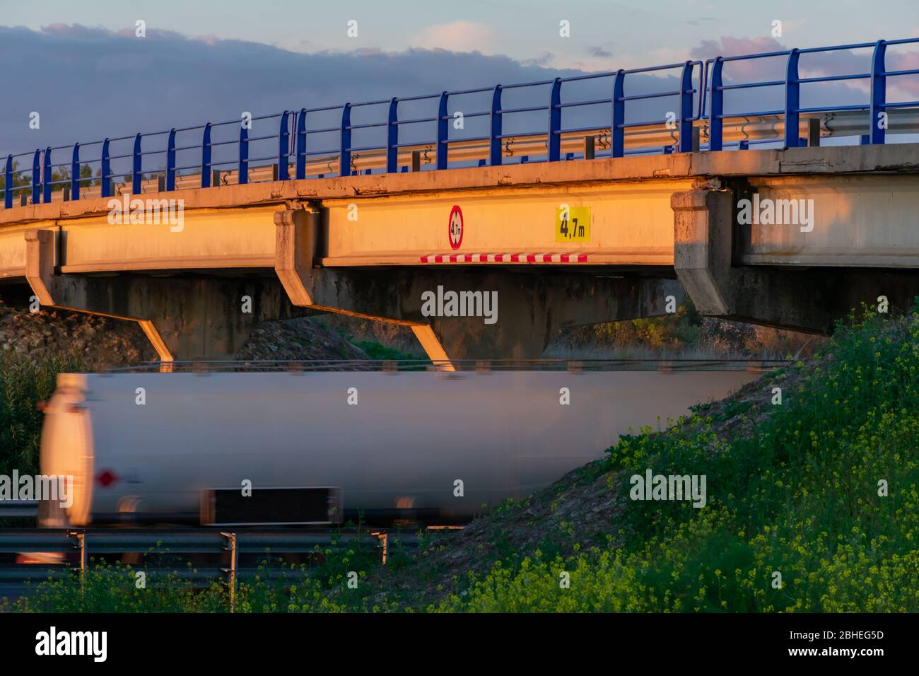 Old bridge over the highway with the maximum height indicator, 4.70 ...
