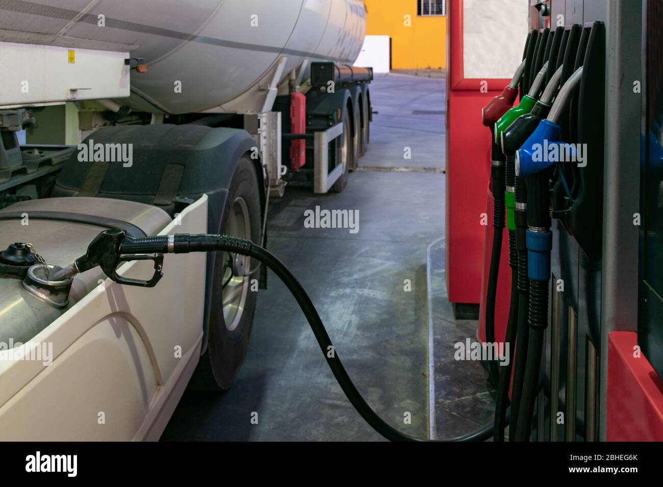 Tank truck supplying diesel fuel at a service station Stock Photo - Alamy
