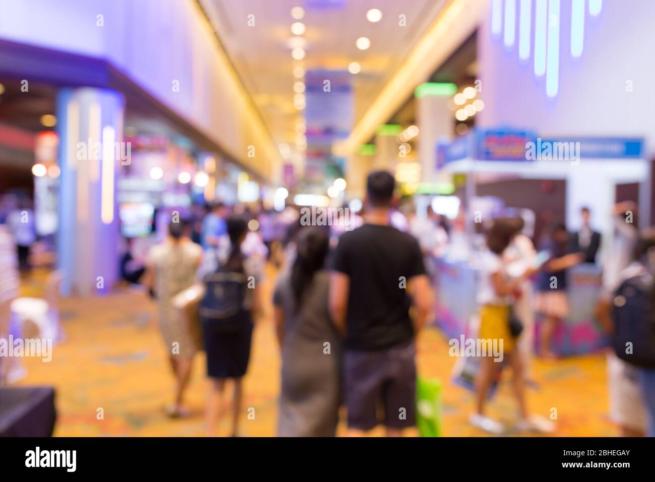 Abstract blurred event exhibition with people background, business ...