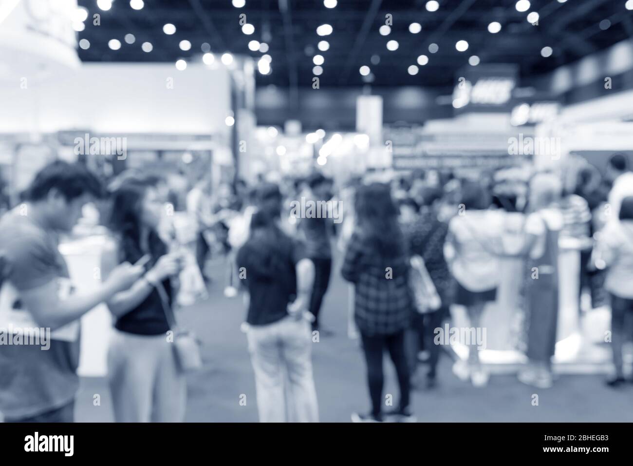 Abstract blurred event exhibition with people background, business ...