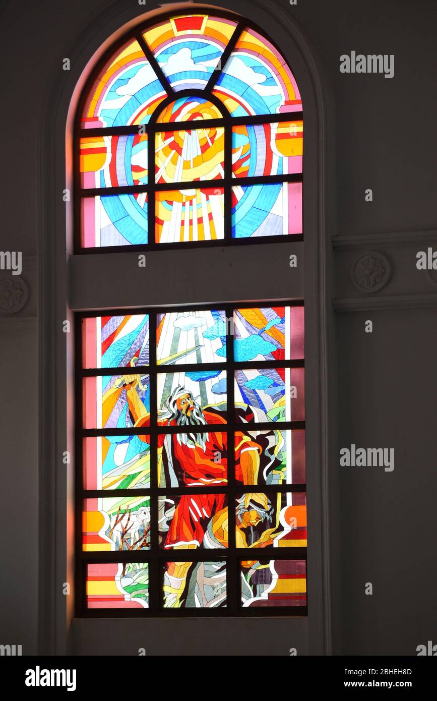 Painting in a church window glass Stock Photo - Alamy