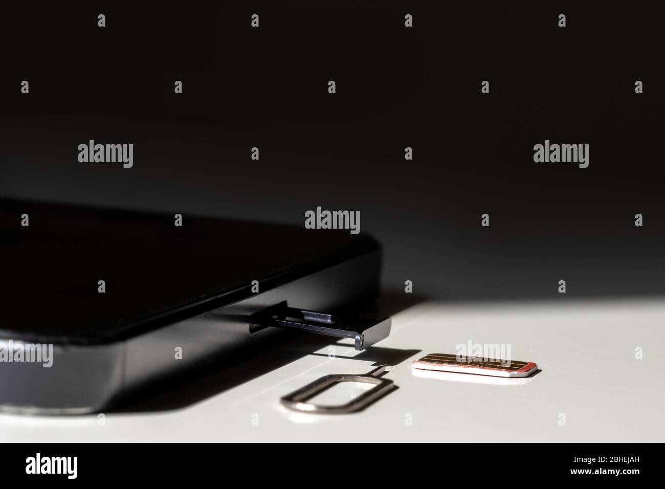 SIM Card, phone and slot on the white background, copy space, top view ...