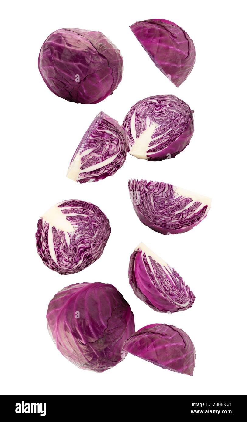 Cutted red cabbage falling isolated on white background with clipping ...