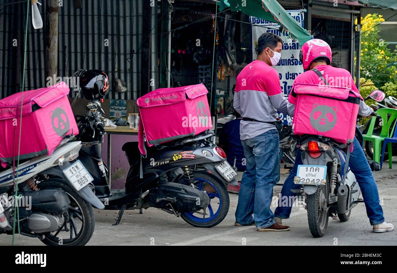 Food delivery by motorcycle in Thailand Stock Photo - Alamy