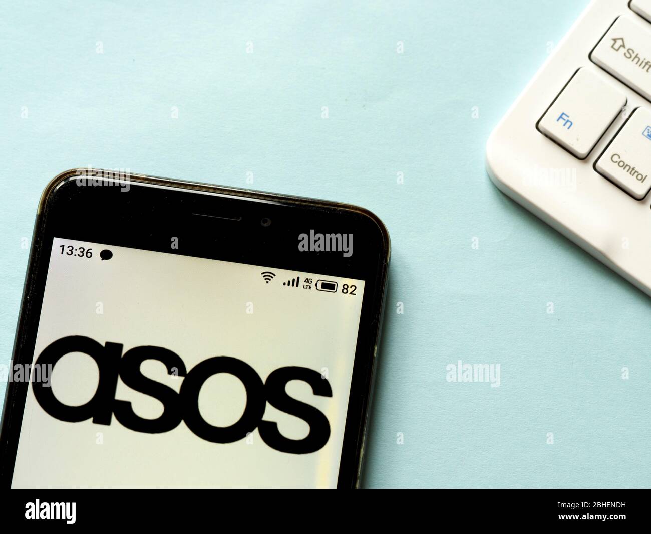 In this photo illustration Asos logo is seen displayed on a smartphone ...