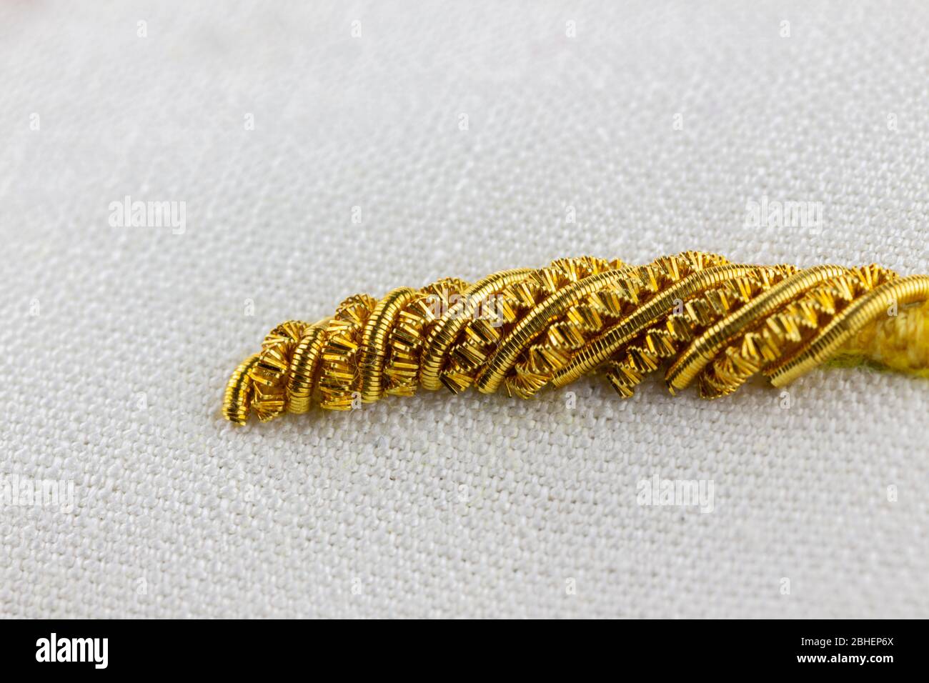 sample of 3 dimensional goldwork embroidery stitching. Padding raises ...