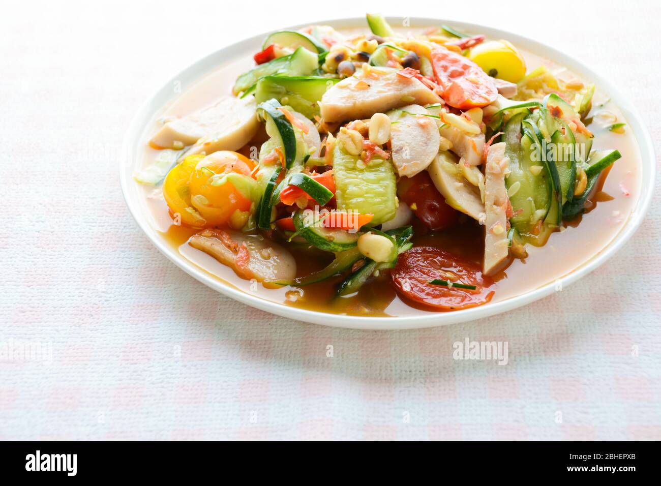 Cucumber salad with preserved pork sausages, Thai popular food called ...