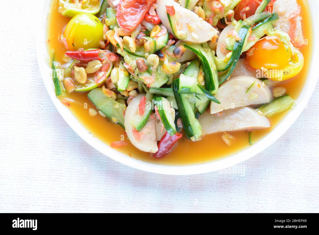 Cucumber salad with preserved pork sausages, Thai popular food called ...