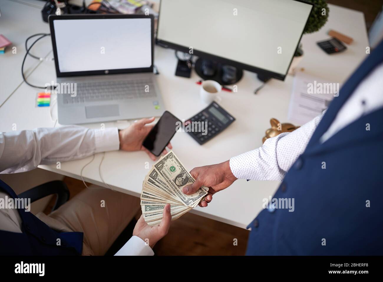 giving and receiving cash from hand to hand. business, bribe concept ...