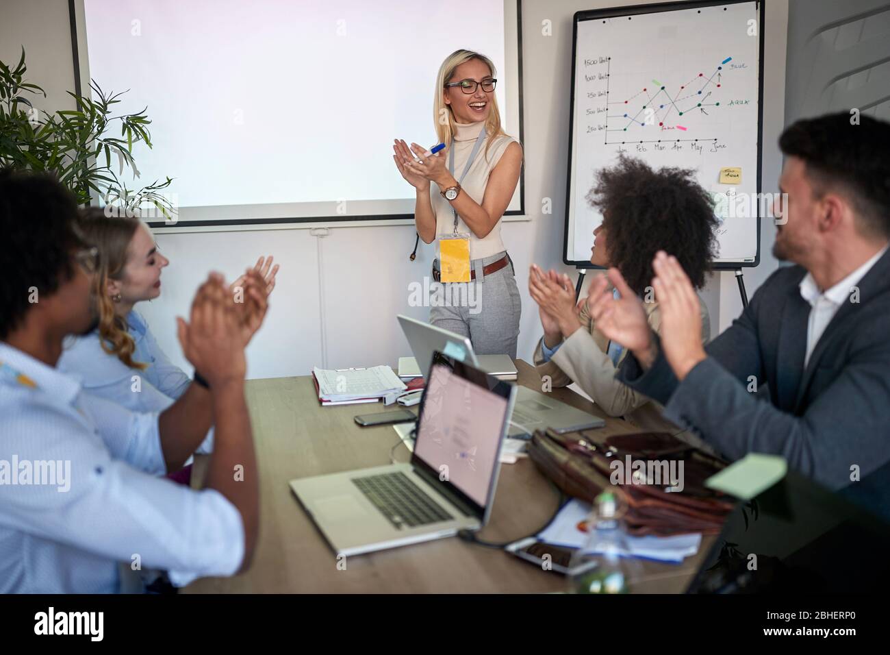 successful end of business presentation in modern conference room ...