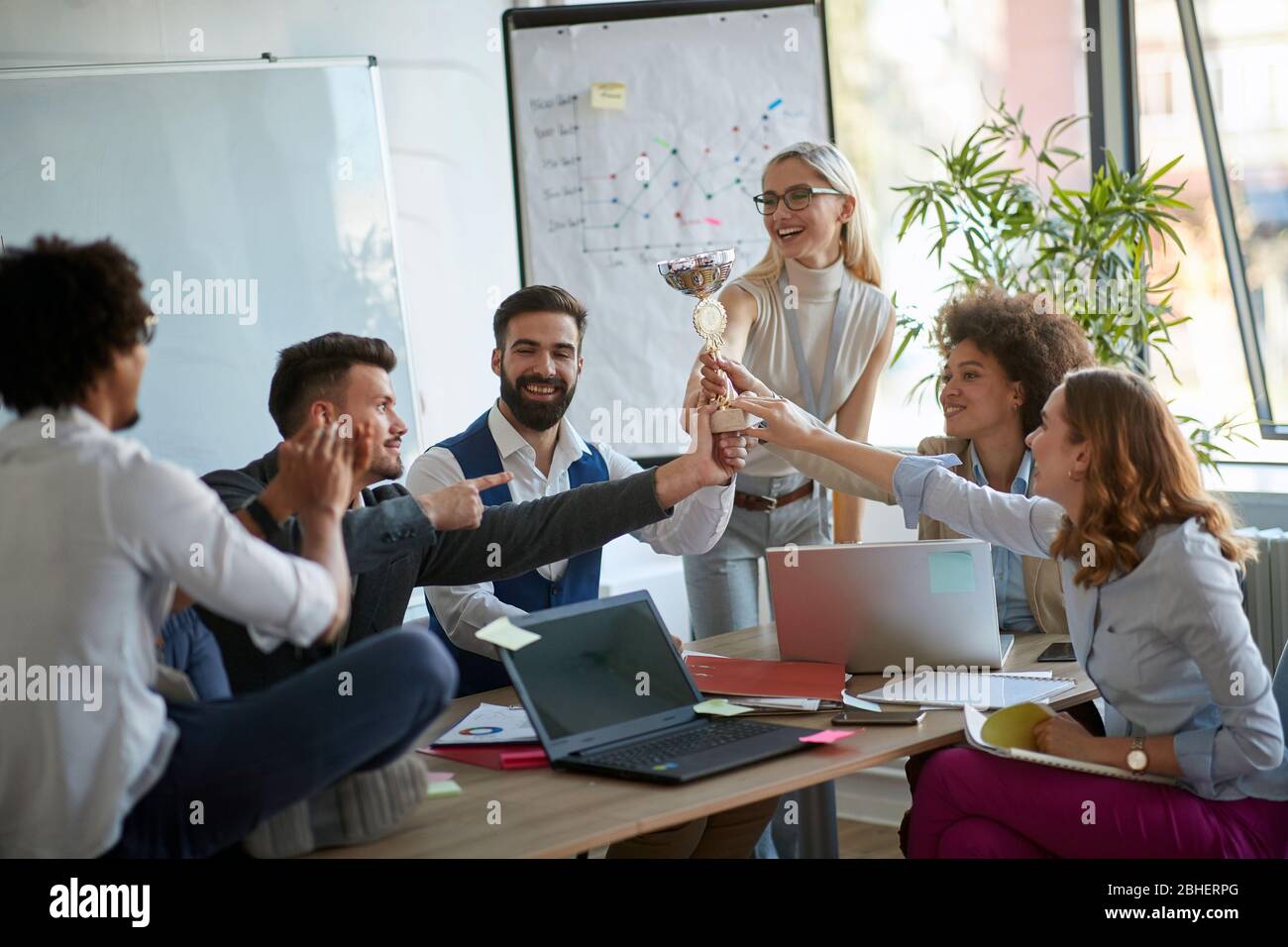 business teamwork concept, togetherness. group of colleagues holding ...