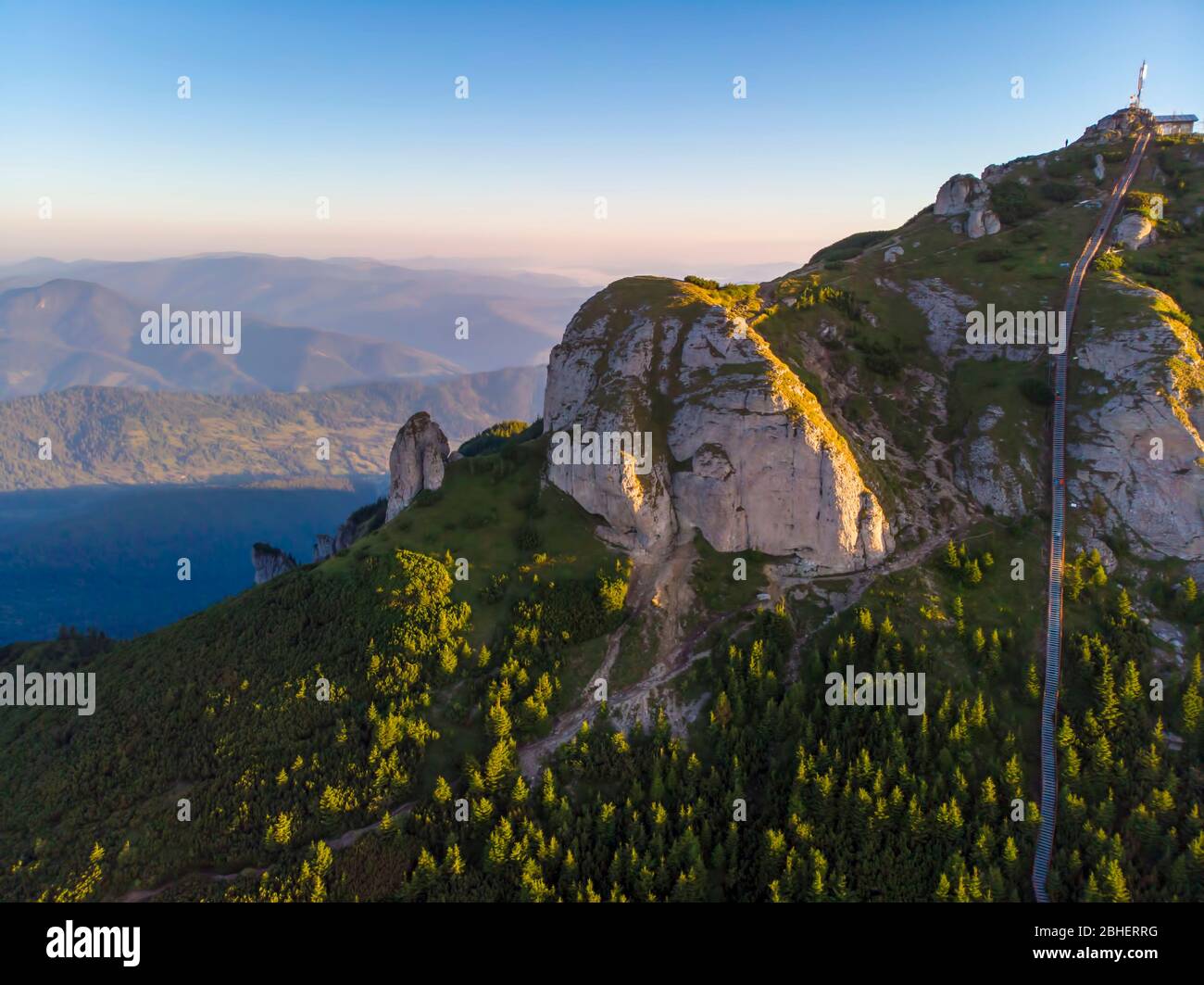 Aerial rocky summit and access stairs in Ceahlau massif, Romanian ...