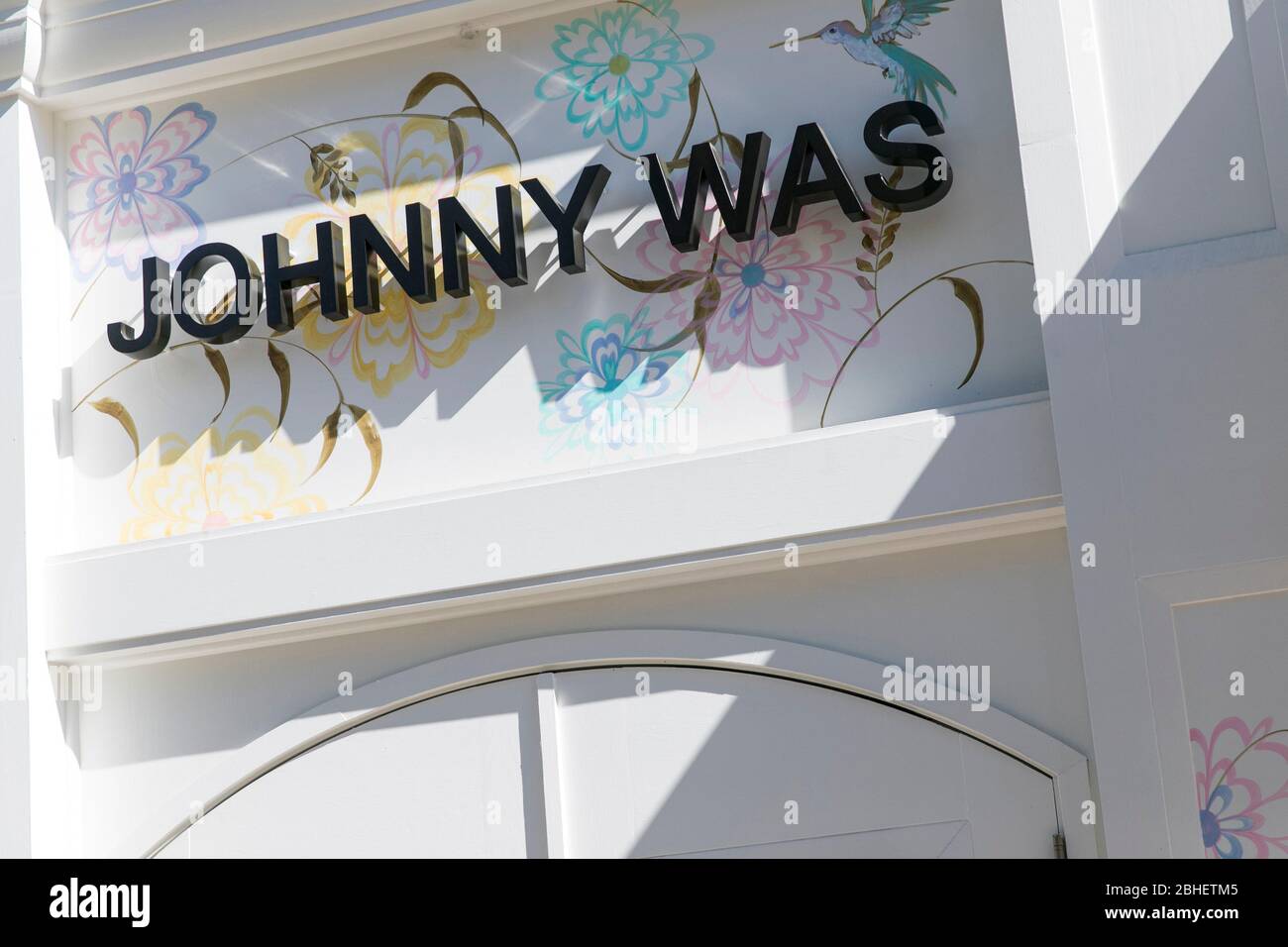 A logo sign outside of a Johnny Was retail store location in Bethesda ...