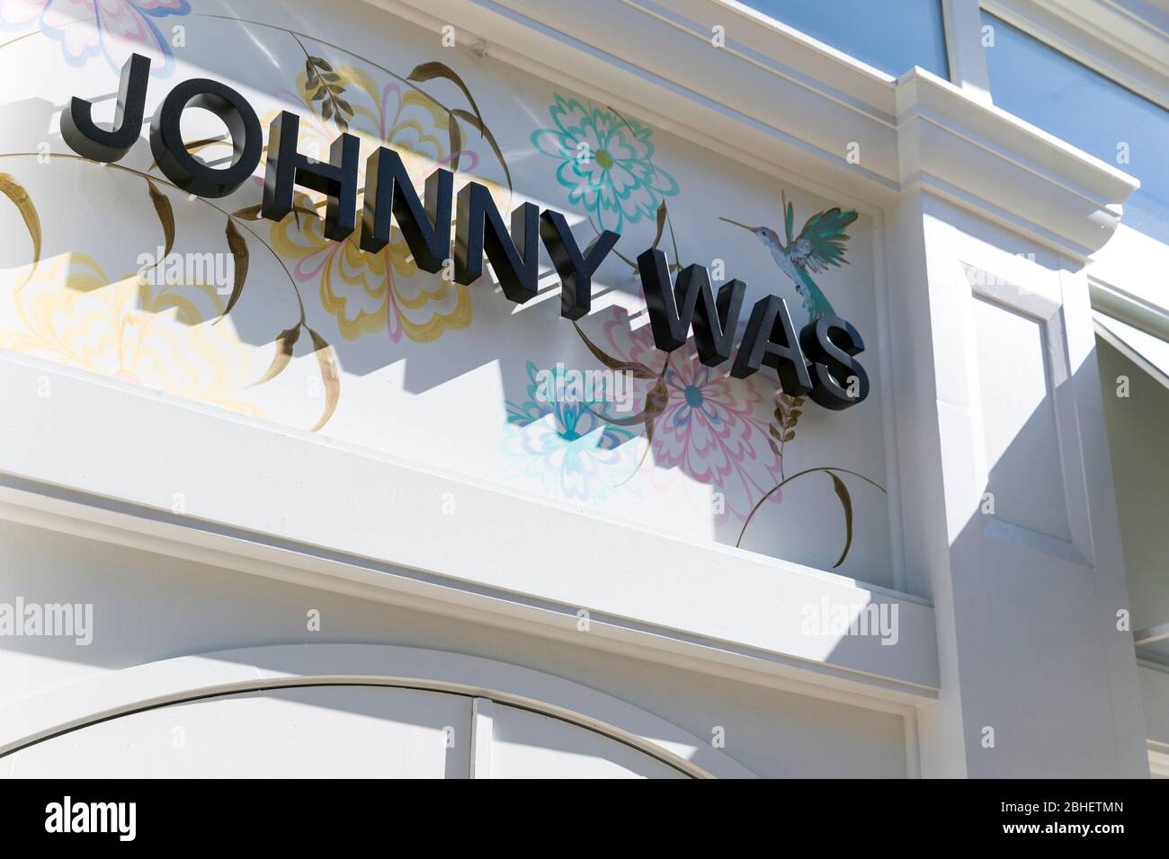 A logo sign outside of a Johnny Was retail store location in Bethesda ...