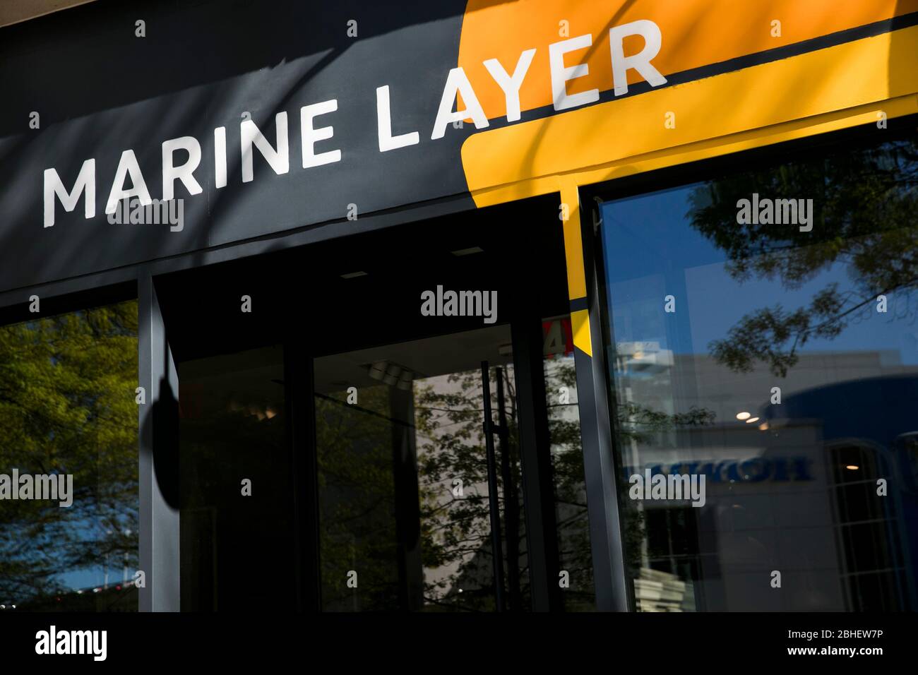 A logo sign outside of a Marine Layer retail store location in Bethesda ...