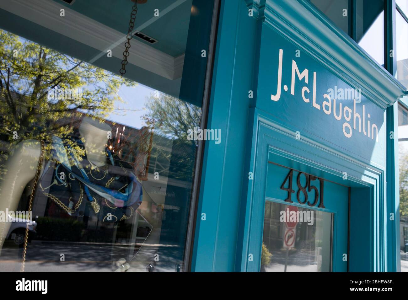 A logo sign outside of a J.McLaughlin retail store location in Bethesda ...